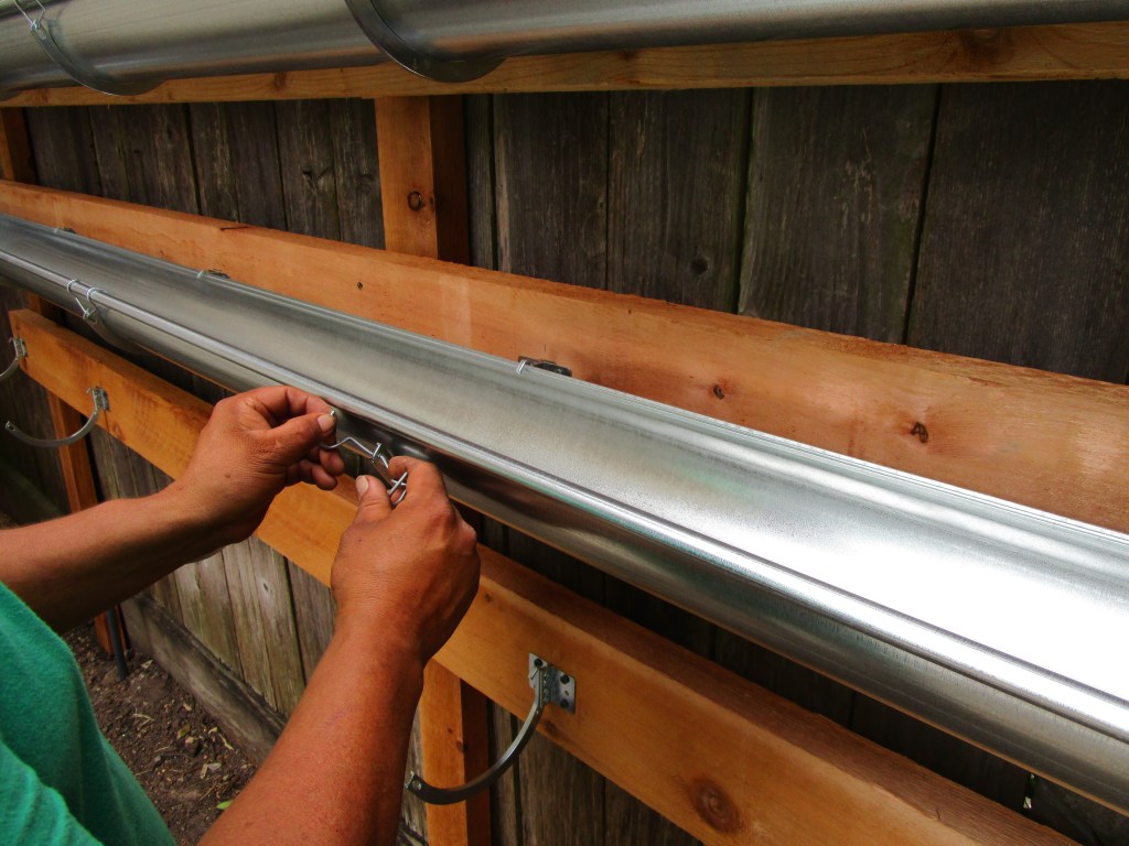 How to Build a Vertical Garden with Rain Gutters | Ravenscourt Gardens