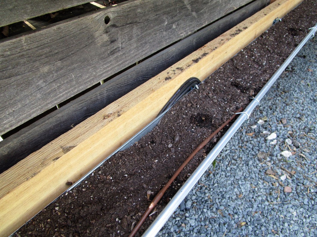 How to Build a Vertical Garden with Rain Gutters | Ravenscourt Gardens